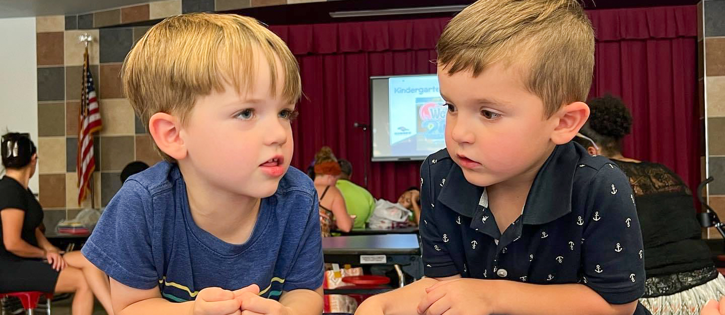 Elementary Students Talking To Each Other
